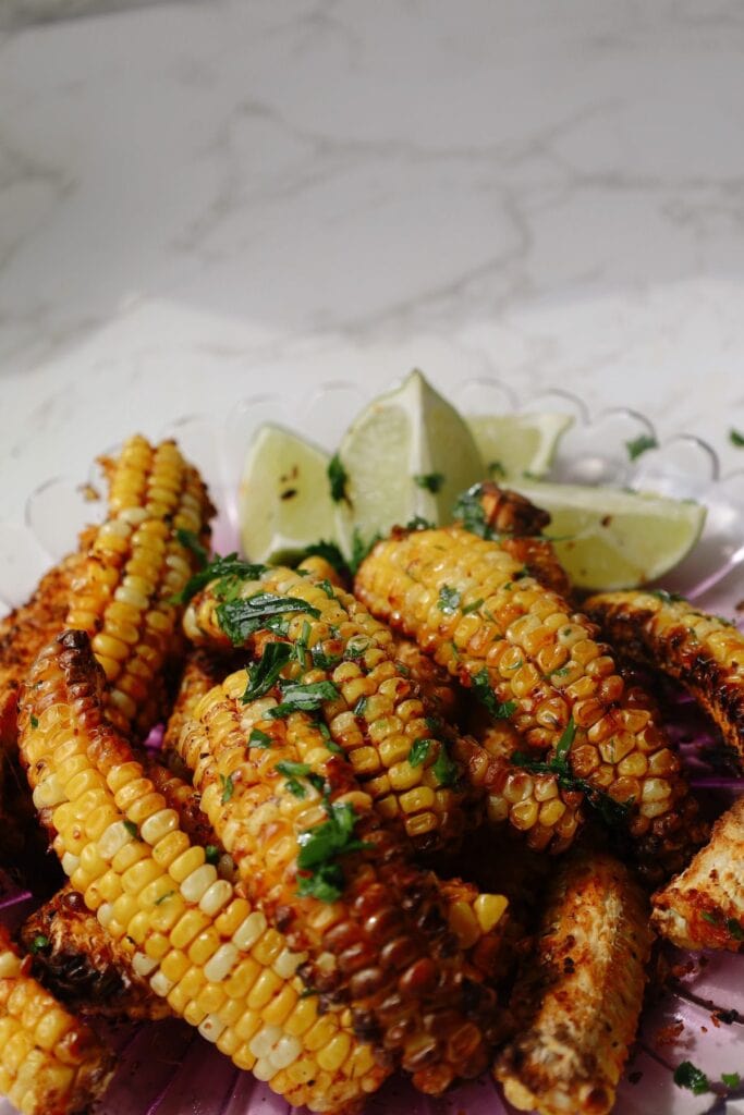 Easy Cajun Butter Corn Ribs Recipe - Shreya's Kitchen