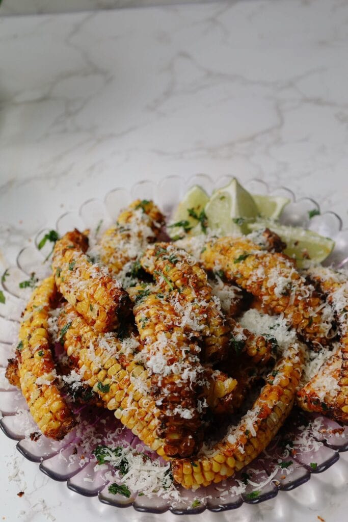 Easy Cajun Butter Corn Ribs Recipe - Shreya's Kitchen