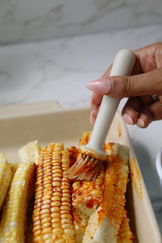 Easy Cajun Butter Corn Ribs Recipe - Shreya's Kitchen